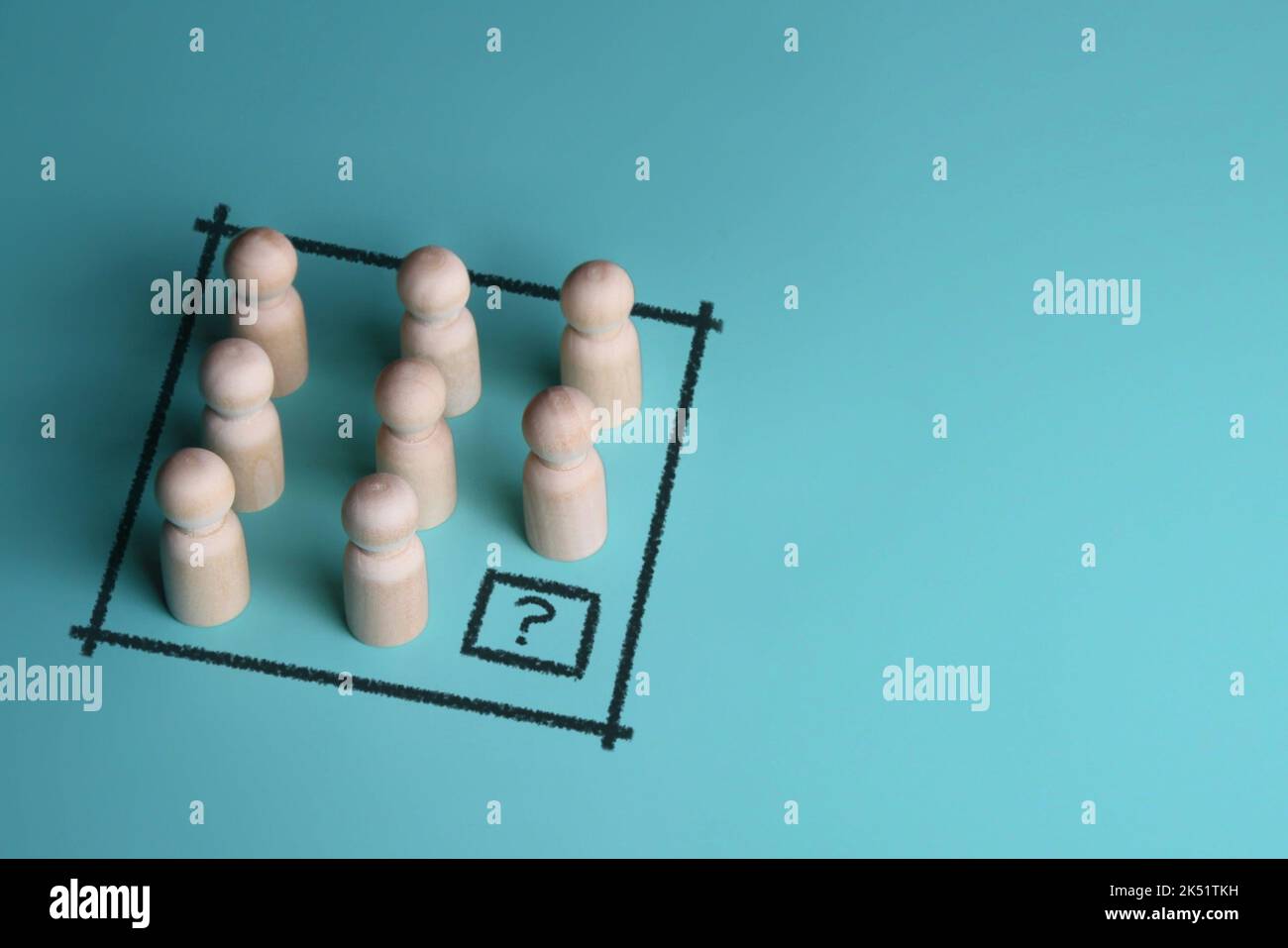 Wooden dolls and question marks. Job vacancy, human resources ...