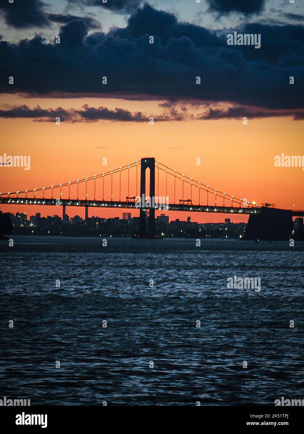 The famous Whitestone Bridge over a background of a sunset Stock Photo ...