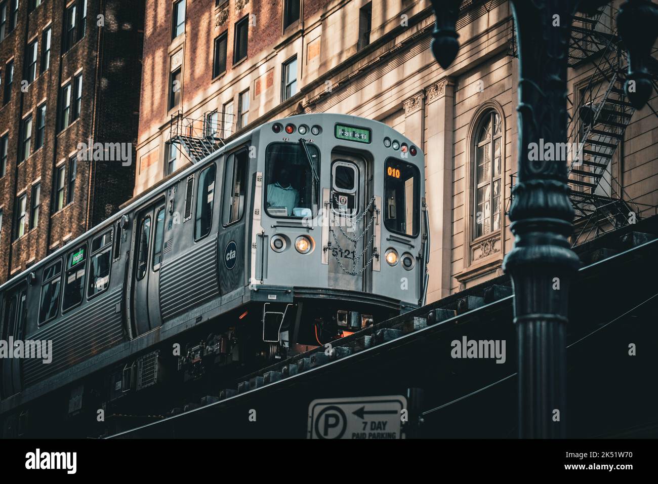 A subway train passing by the historic Chicago downtown Stock Photo - Alamy