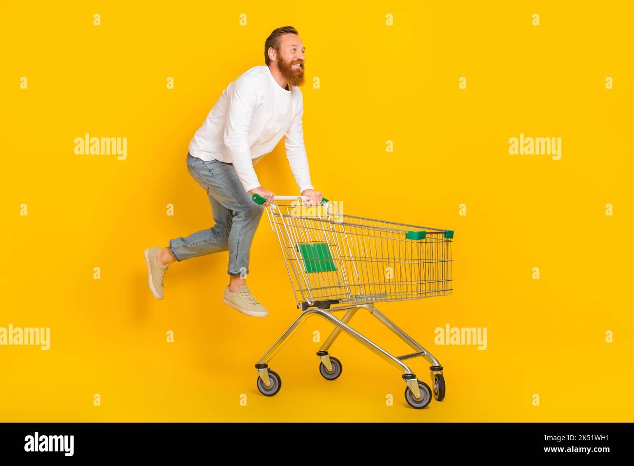 Full body profile photo of beard man run trolley wear shirt jeans shoes ...