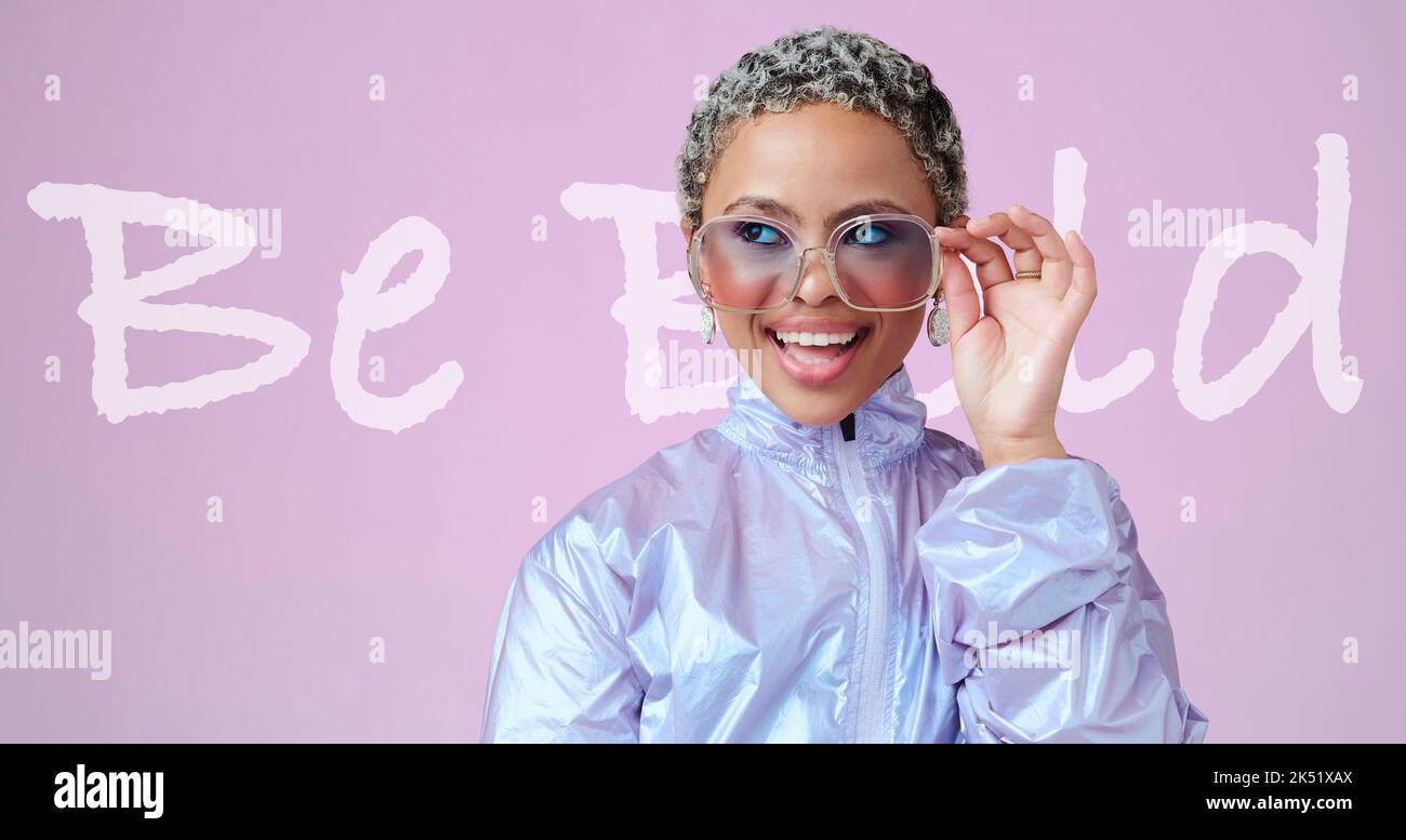Stylish, bold and holographic fashion female with sunglasses and ...