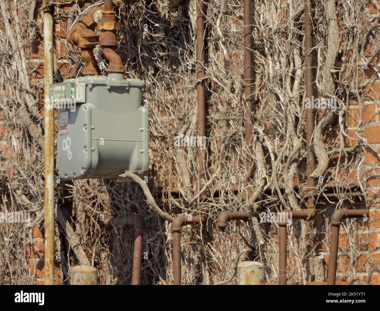 A distribution transformer on the wall in industrial zone Stock Photo ...
