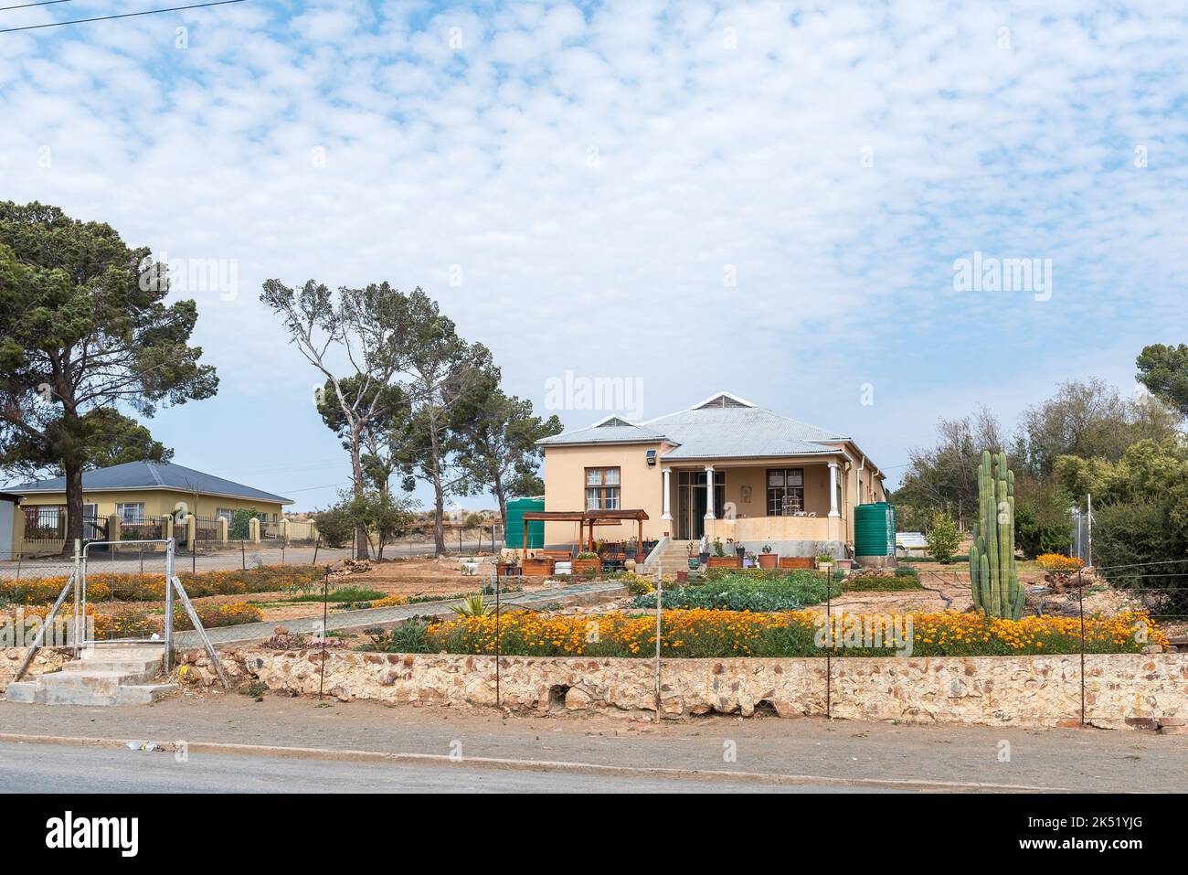 VICTORIA WEST, SOUTH AFRICA - SEP 2, 2022: A street scene, with houses ...