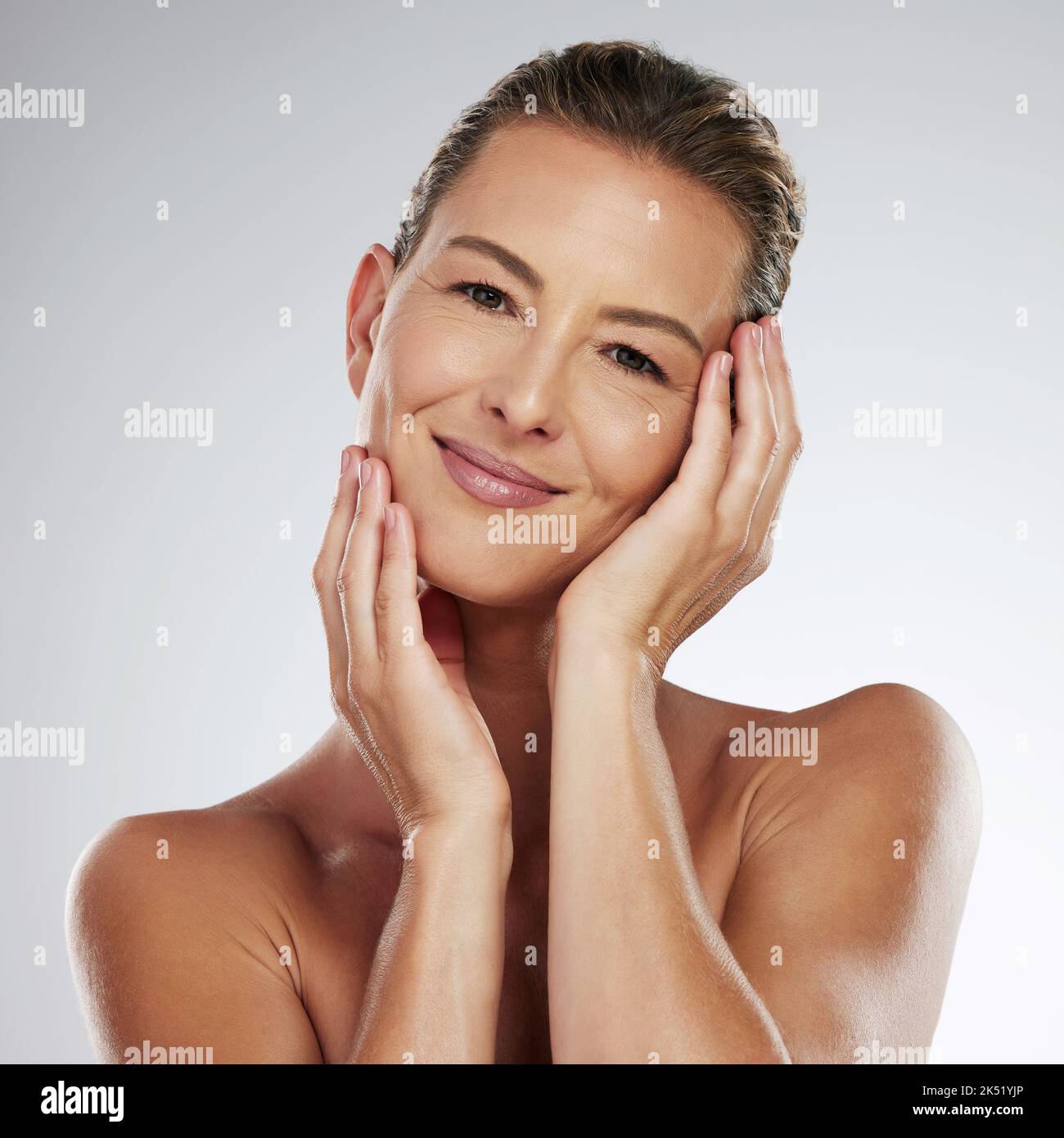 Senior woman, smile and face in skincare and beauty touching soft ...