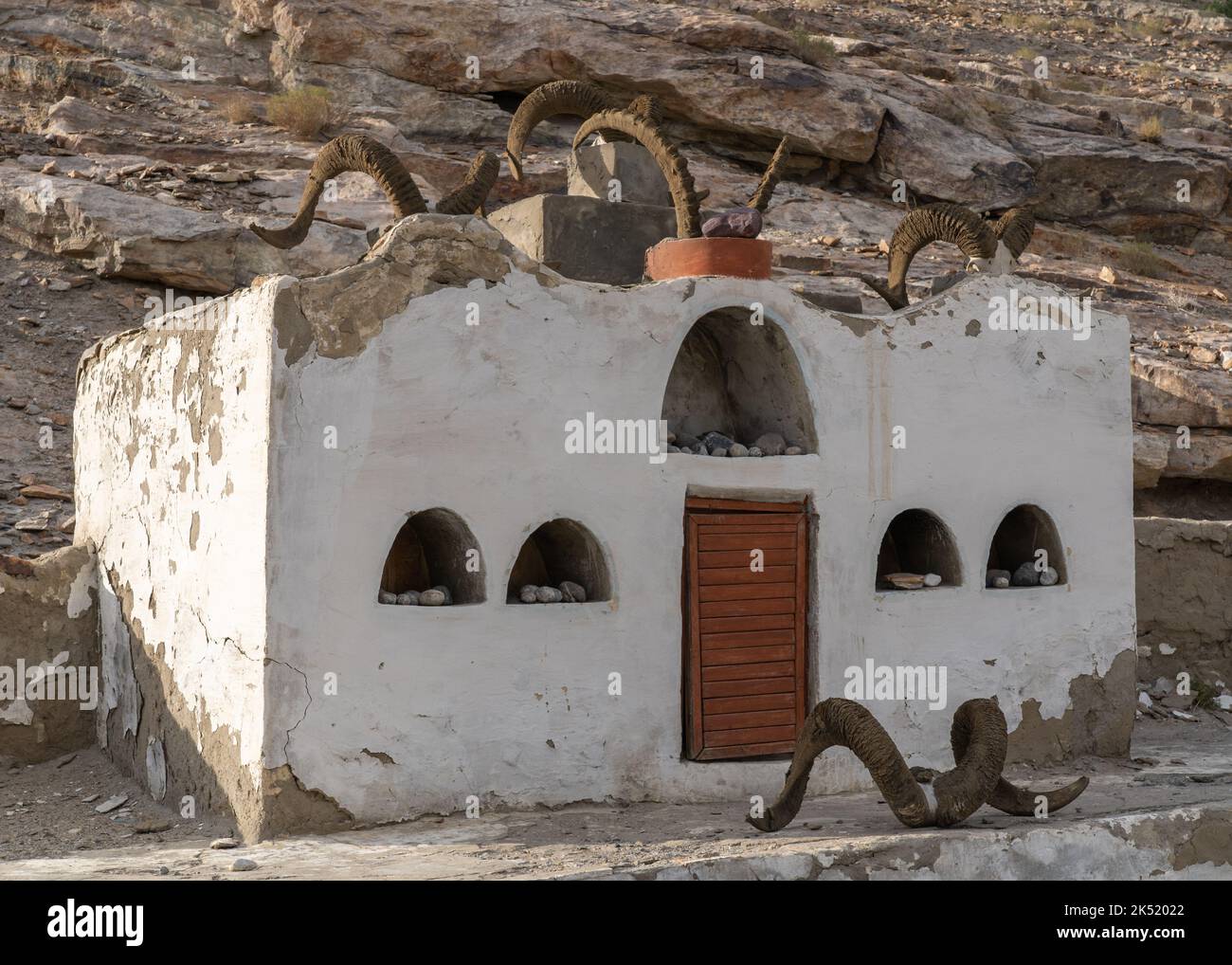 View of a Pamir oston, a typical pre-islamic shrine, decorated with ...