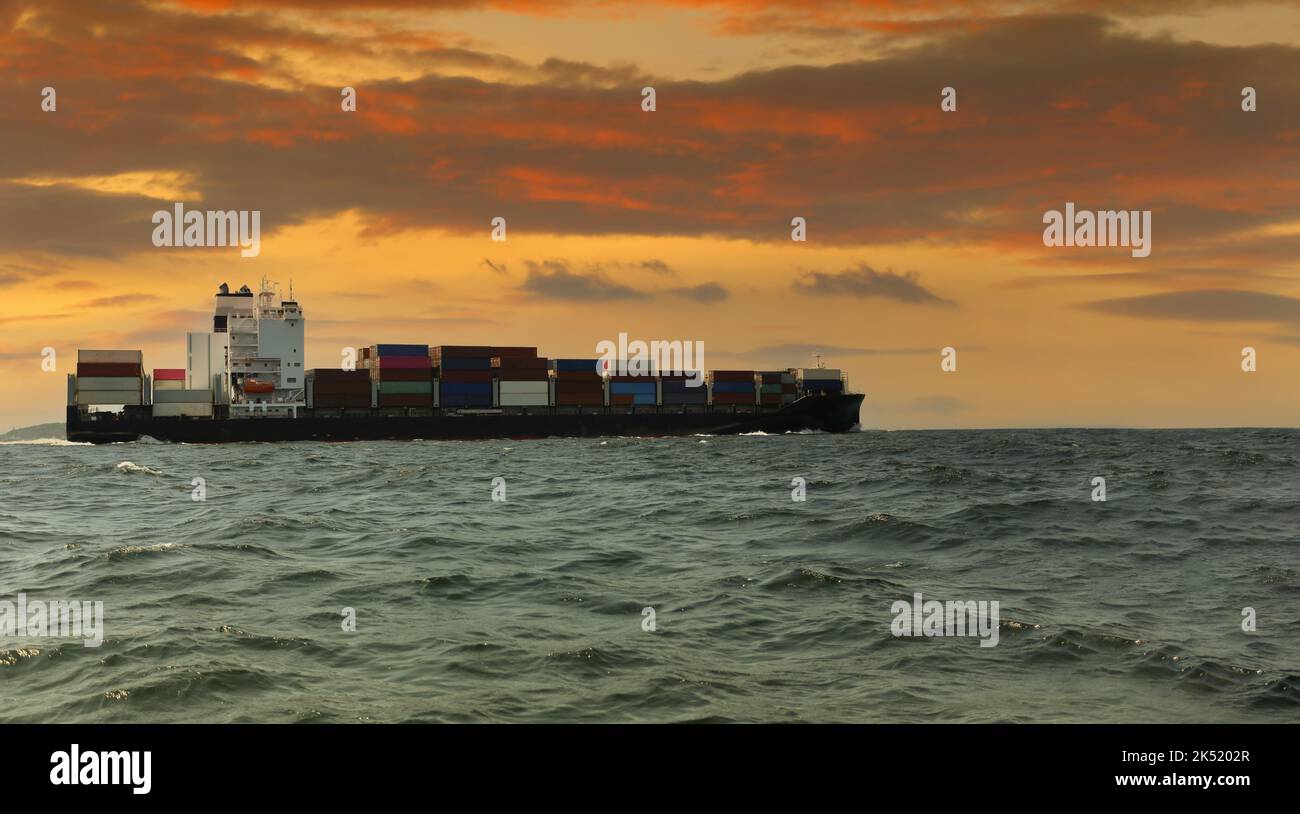 Container ship in sea heading to deliver goods to the destination and ...
