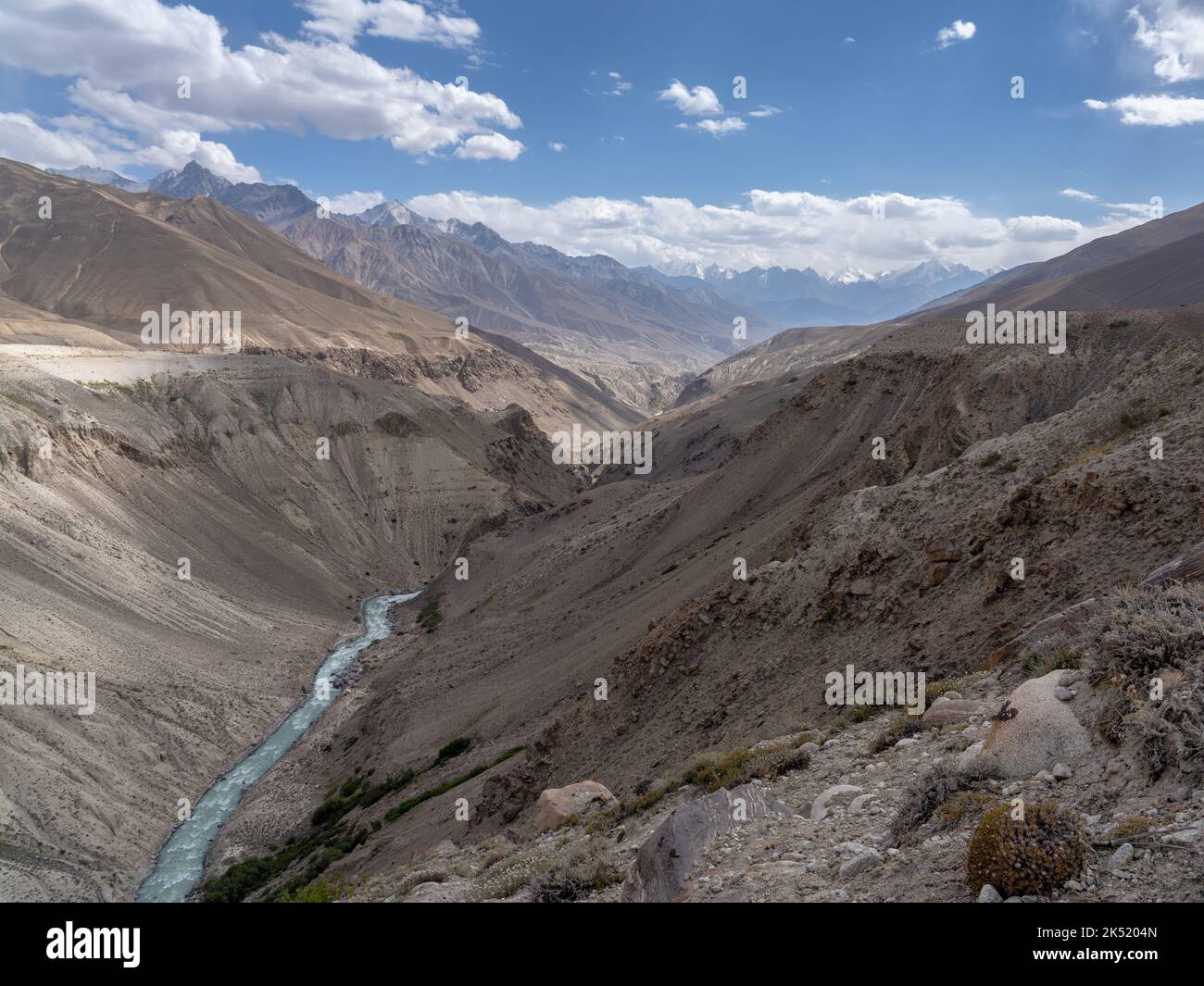 Pamir river valley in high desert between Afghanistan and Tajikistan in ...