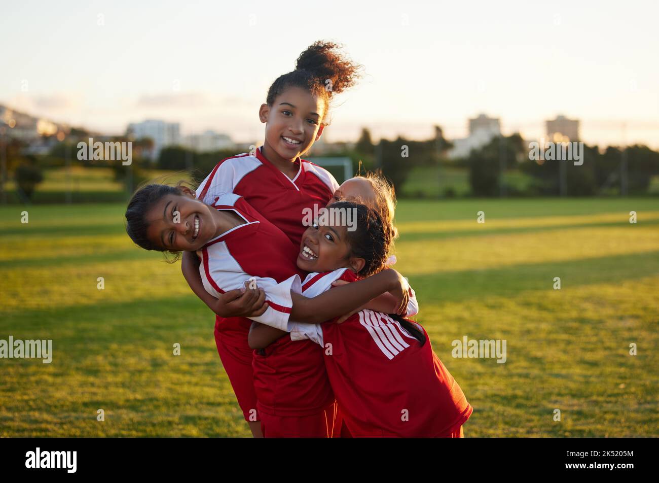 Soccer, friends and winner with team of children in park for fitness ...