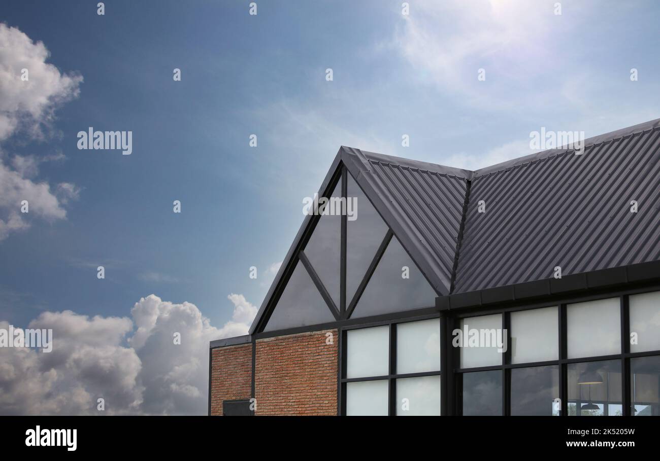 Modern house roof on blue sky background for design in your work Stock ...