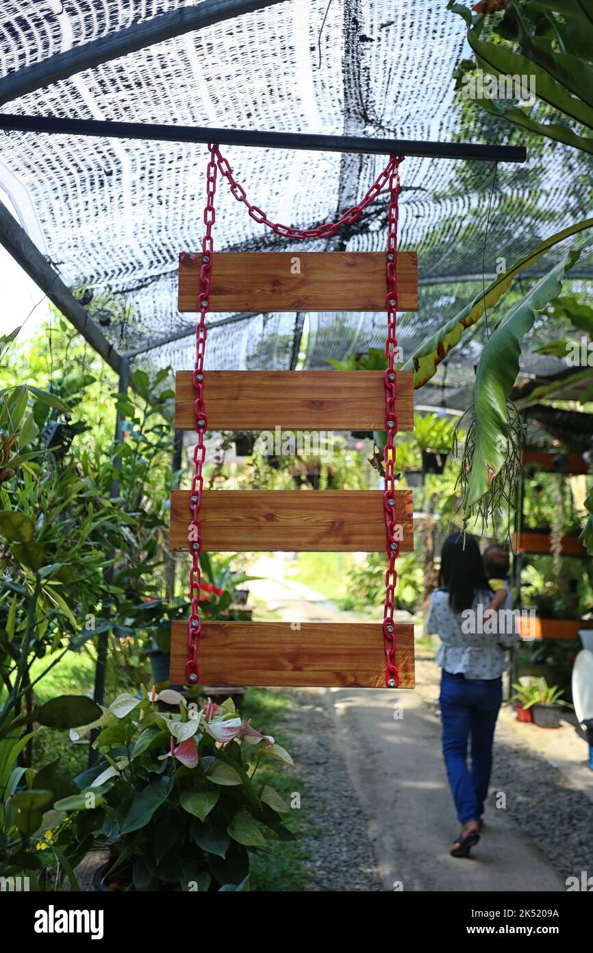Empty wooden sign in the garden, Wooden signs indicating different ...