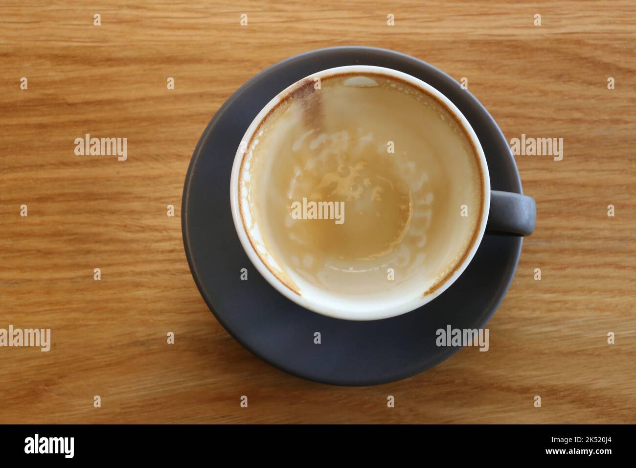 Coffee mugs placed on a table in a coffee shop, Empty coffee cup after ...