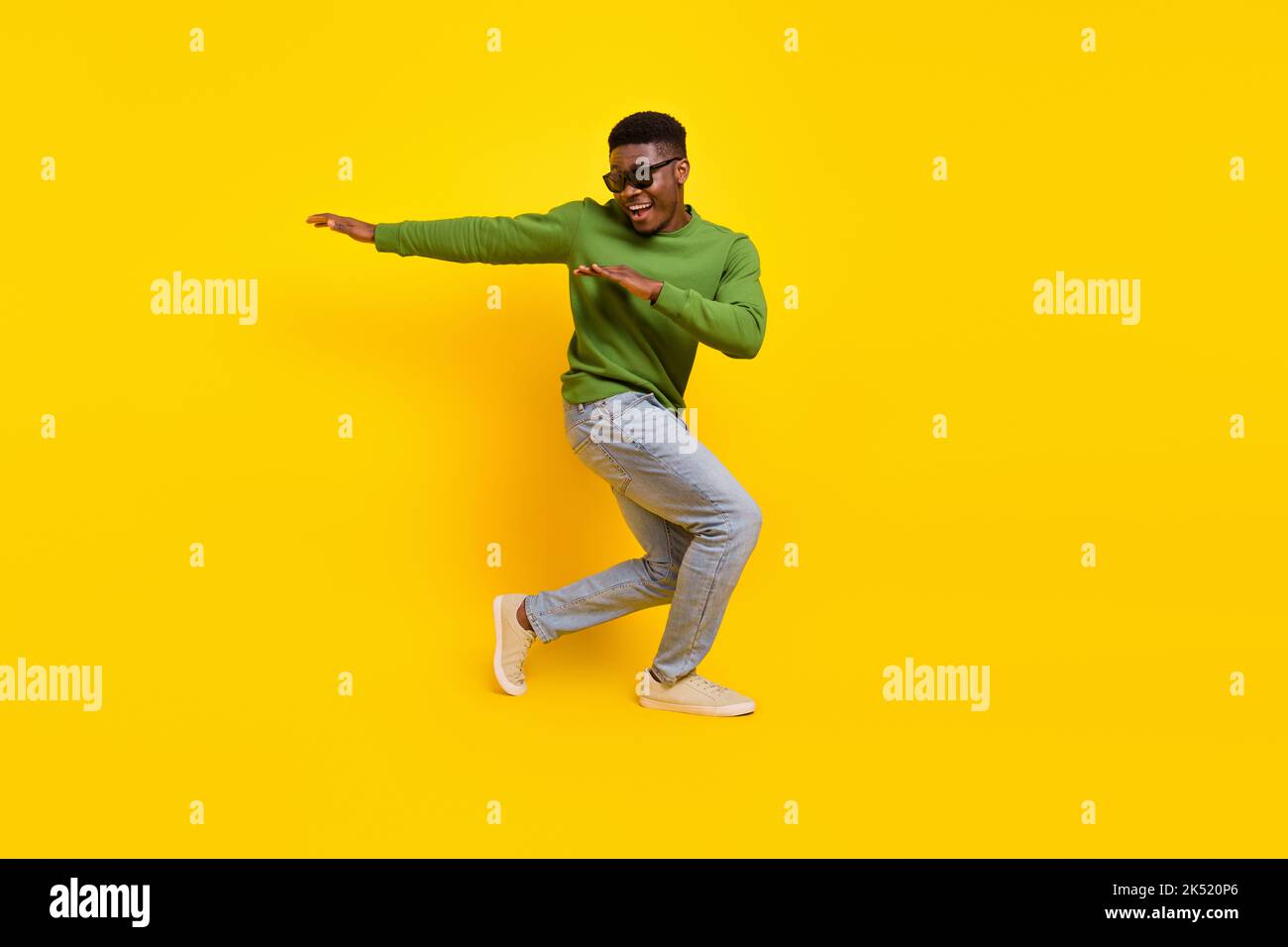 Full length body size view of attractive cheery guy dancing fooling ...