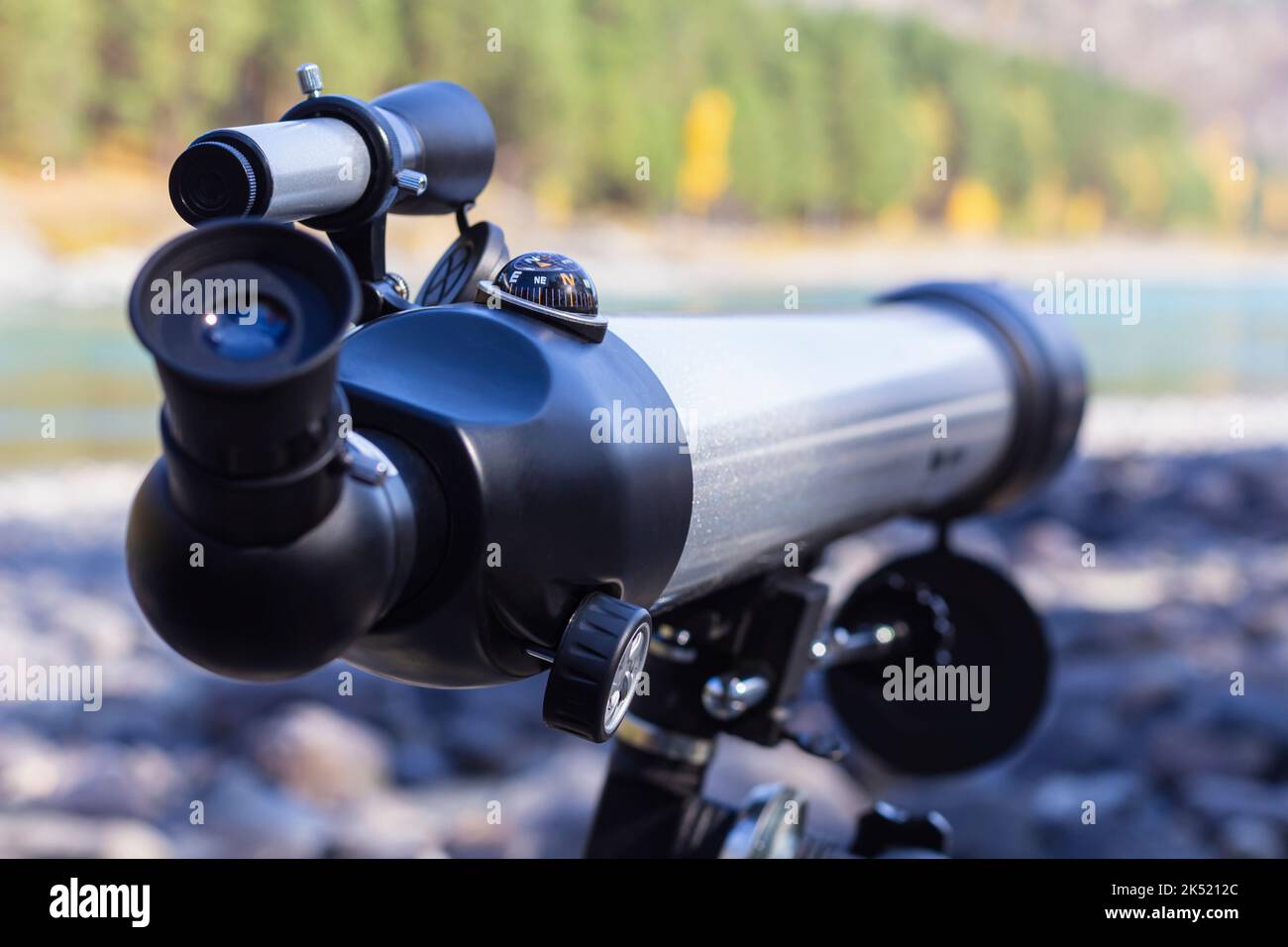 Large gray telescope for watch celestial bodys on mountainside ...
