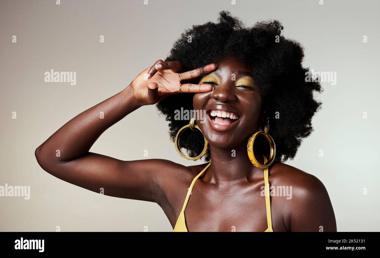 Beauty peace sign, black woman with gold makeup on healthy skin and ...