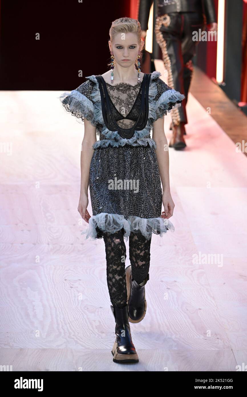 Model Lex Peckham walks on the runway at the Louis Vuitton fashion show ...