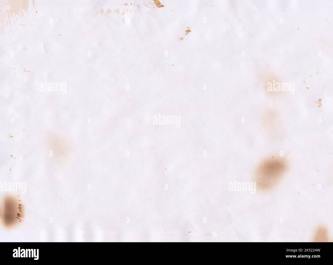 Vintage colored of old paper background with thermal burn marks for ...