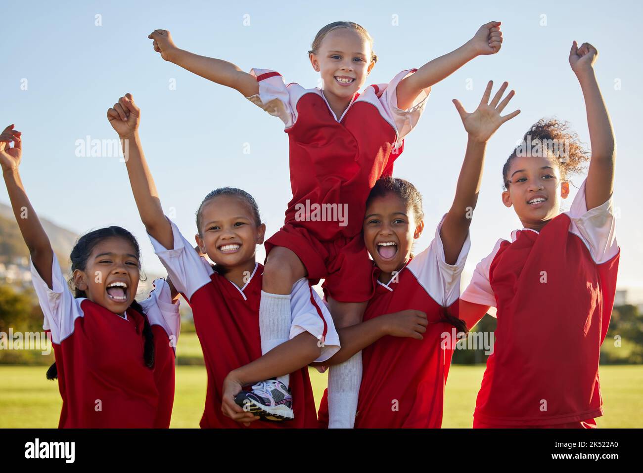 Soccer, team and girls celebrate winning, success and competitive game ...