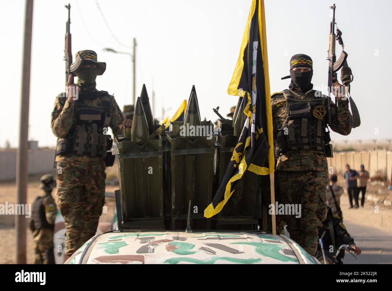 Armed masked fighters of Al-Quds Brigades, the military wing of Islamic ...