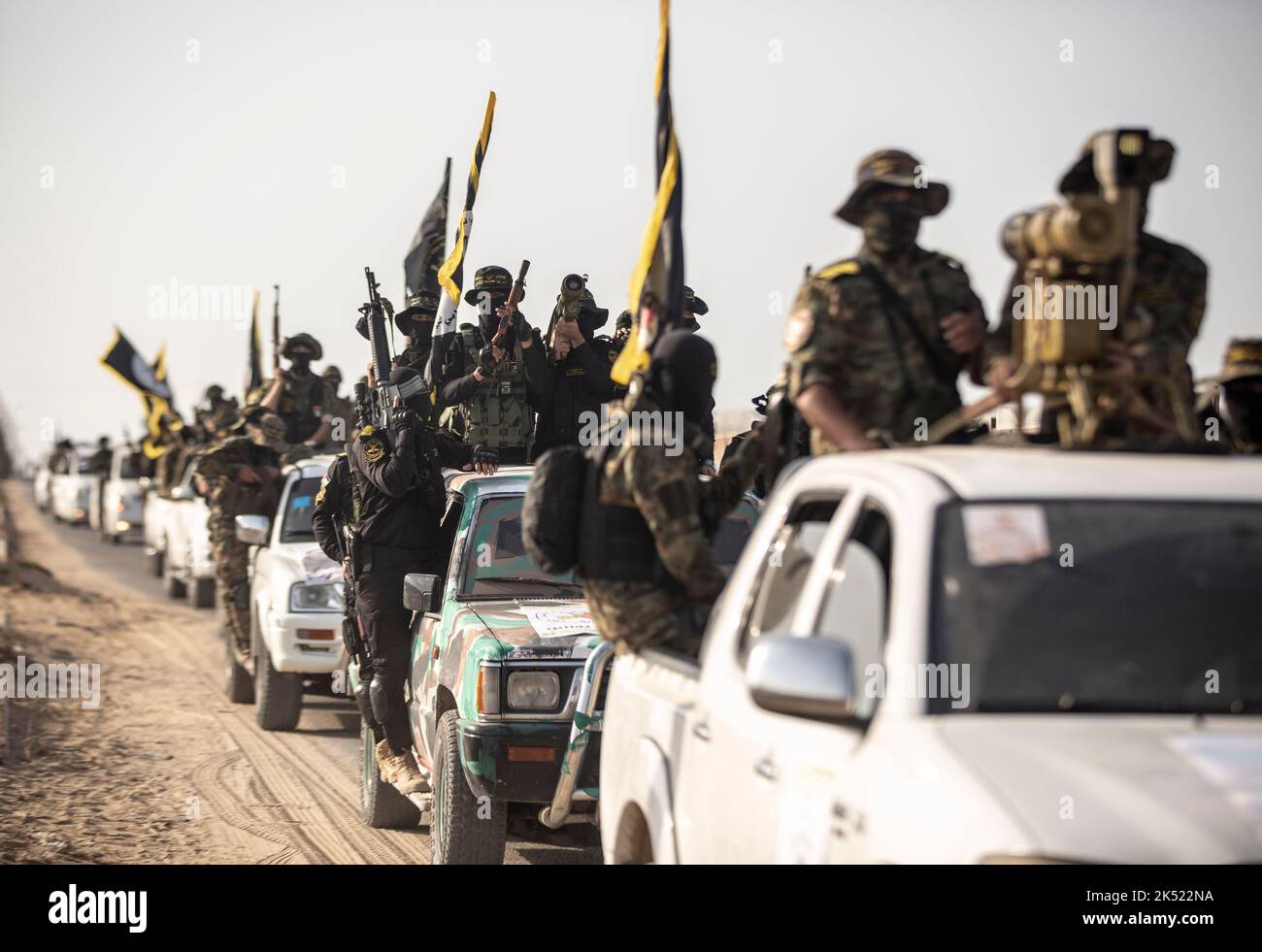 Armed masked fighters of Al-Quds Brigades, the military wing of Islamic ...