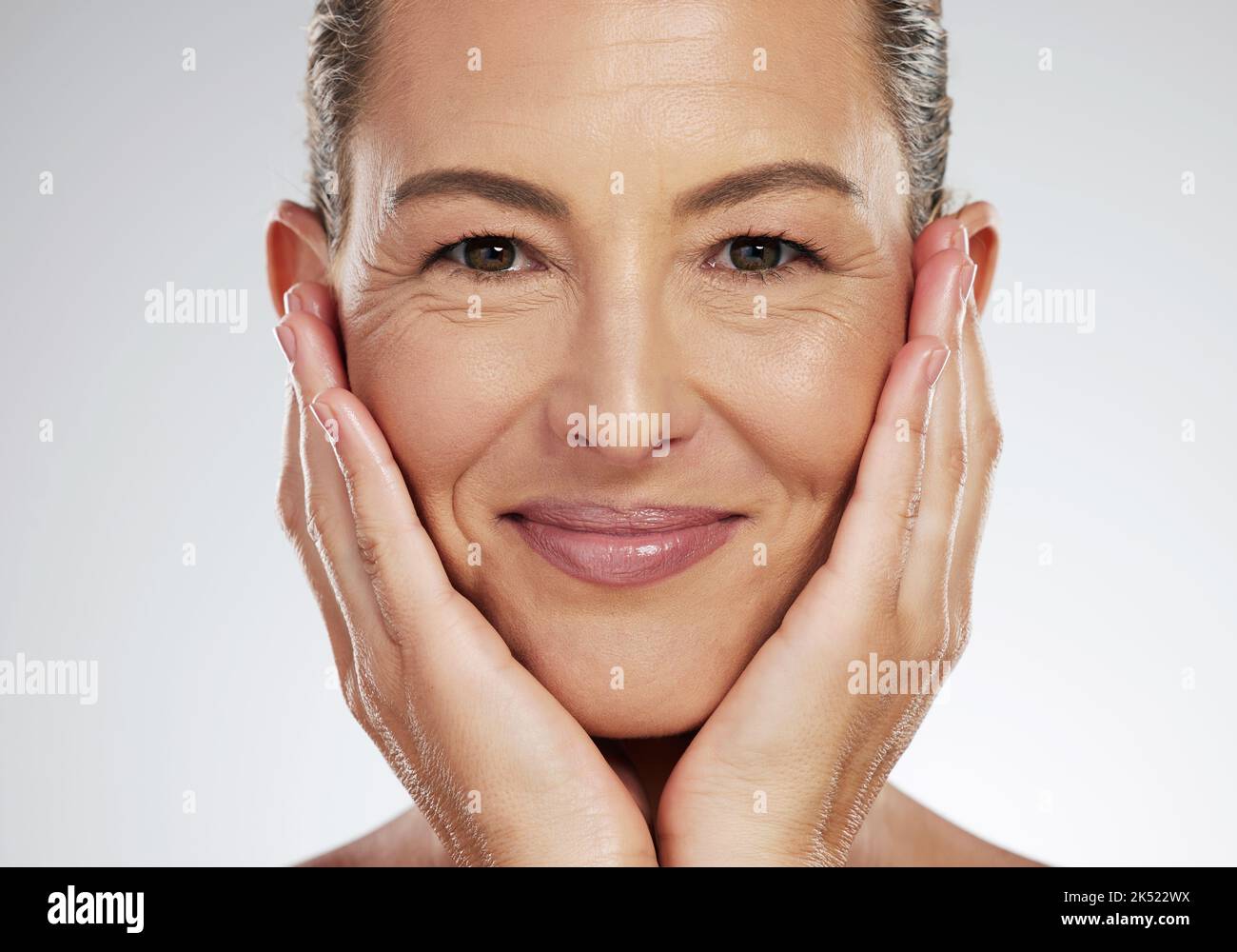 Senior woman, face and skincare smile for beauty touching soft and ...