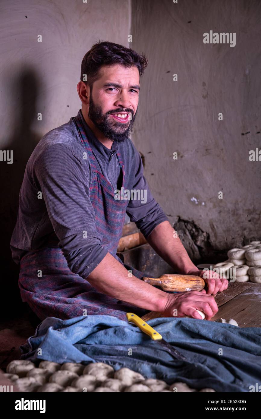 A man preparing dough for bread in Leh, Ladakh, India Stock Photo - Alamy