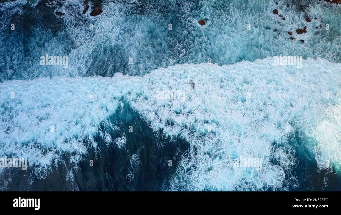 Beautiful texture of dark ocean waves with white foam. Drone filming ...