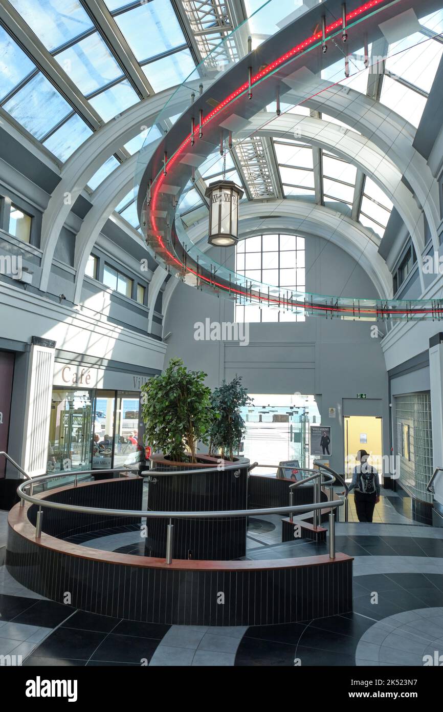 The interior of an elegant, pastel-painted arcade on Douglas promenade ...
