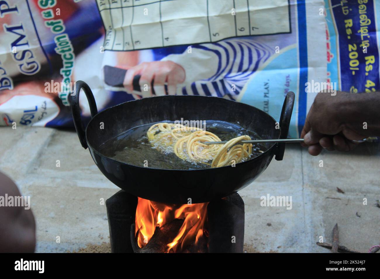 Preparing South Indian Homemade rice Murukku for Diwali festival snacks ...
