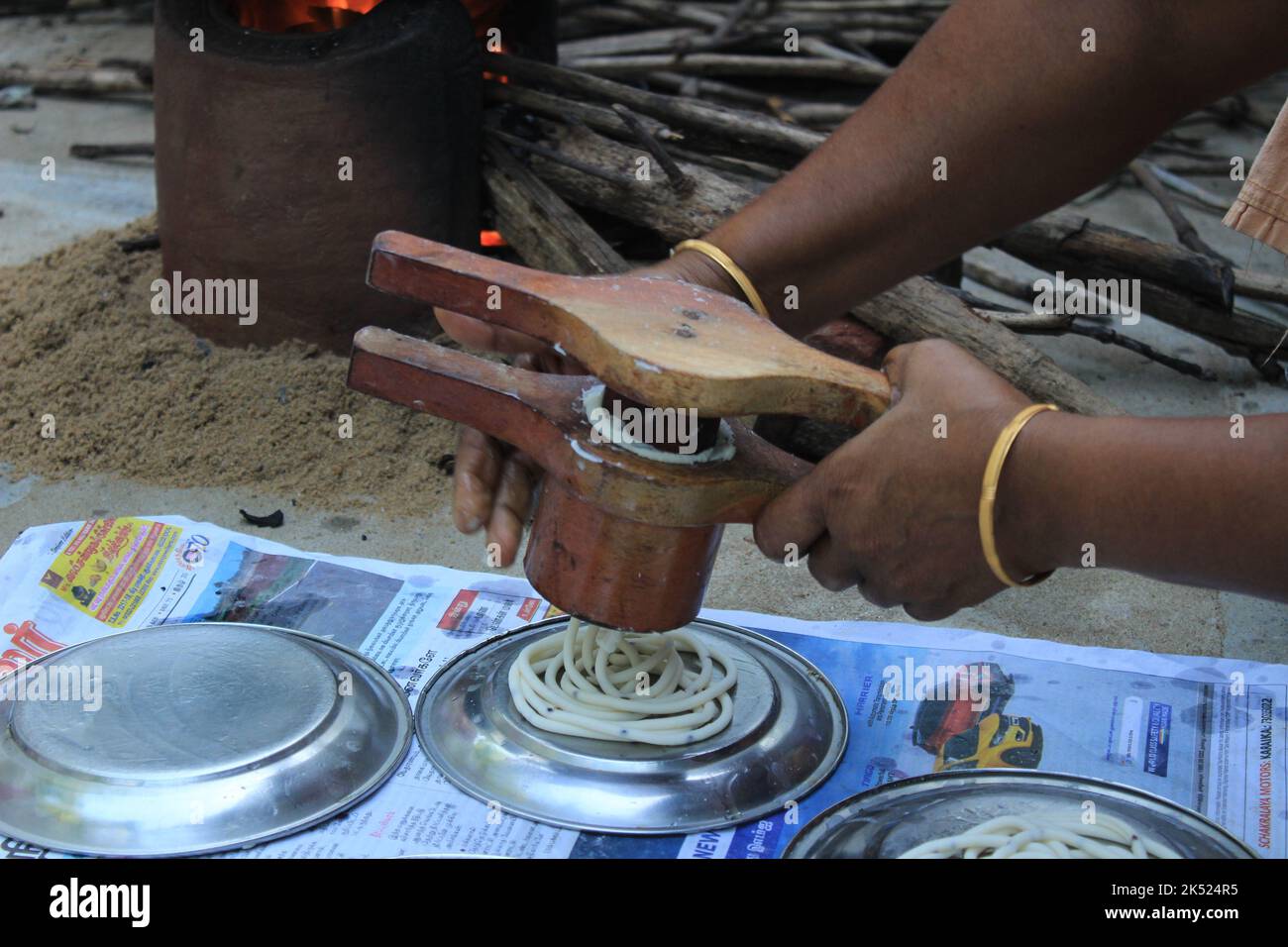 Preparing South Indian Homemade rice Murukku for Diwali festival snacks ...