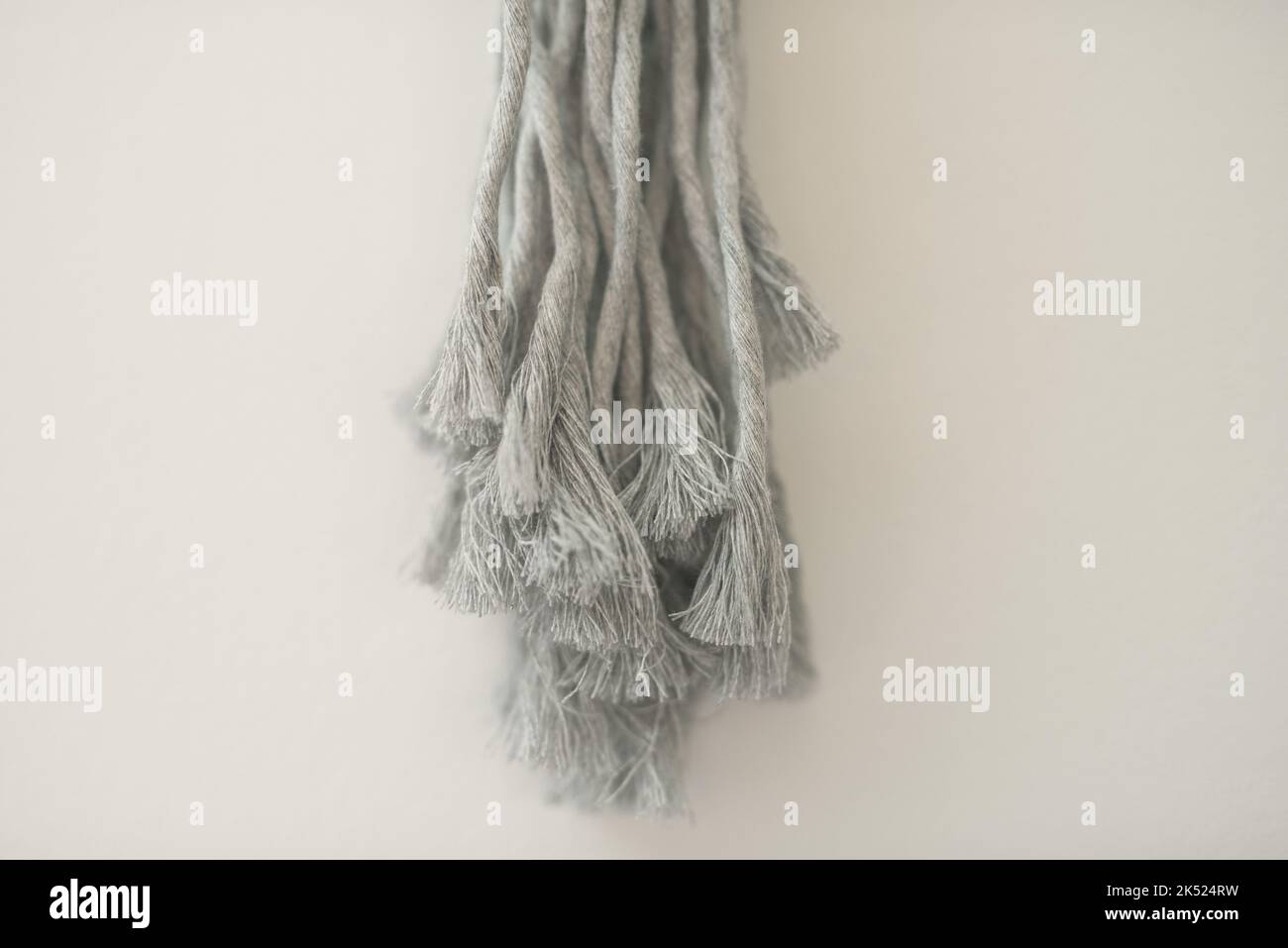 macrame cotton white gray string fabric white wall background Stock ...