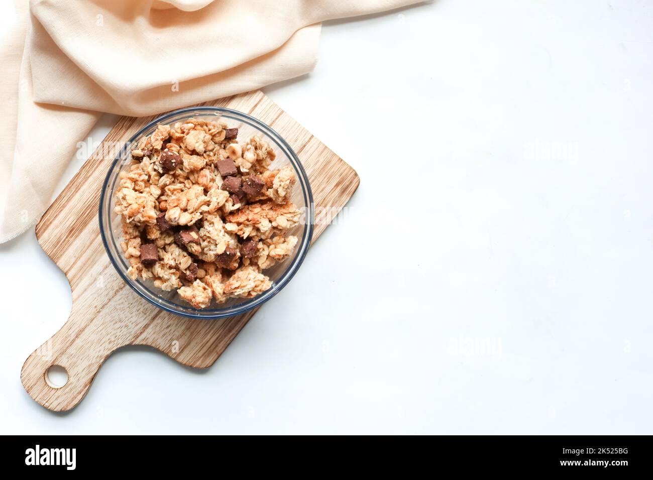 chocolate Musli in a bowl on white background with copy space Stock ...