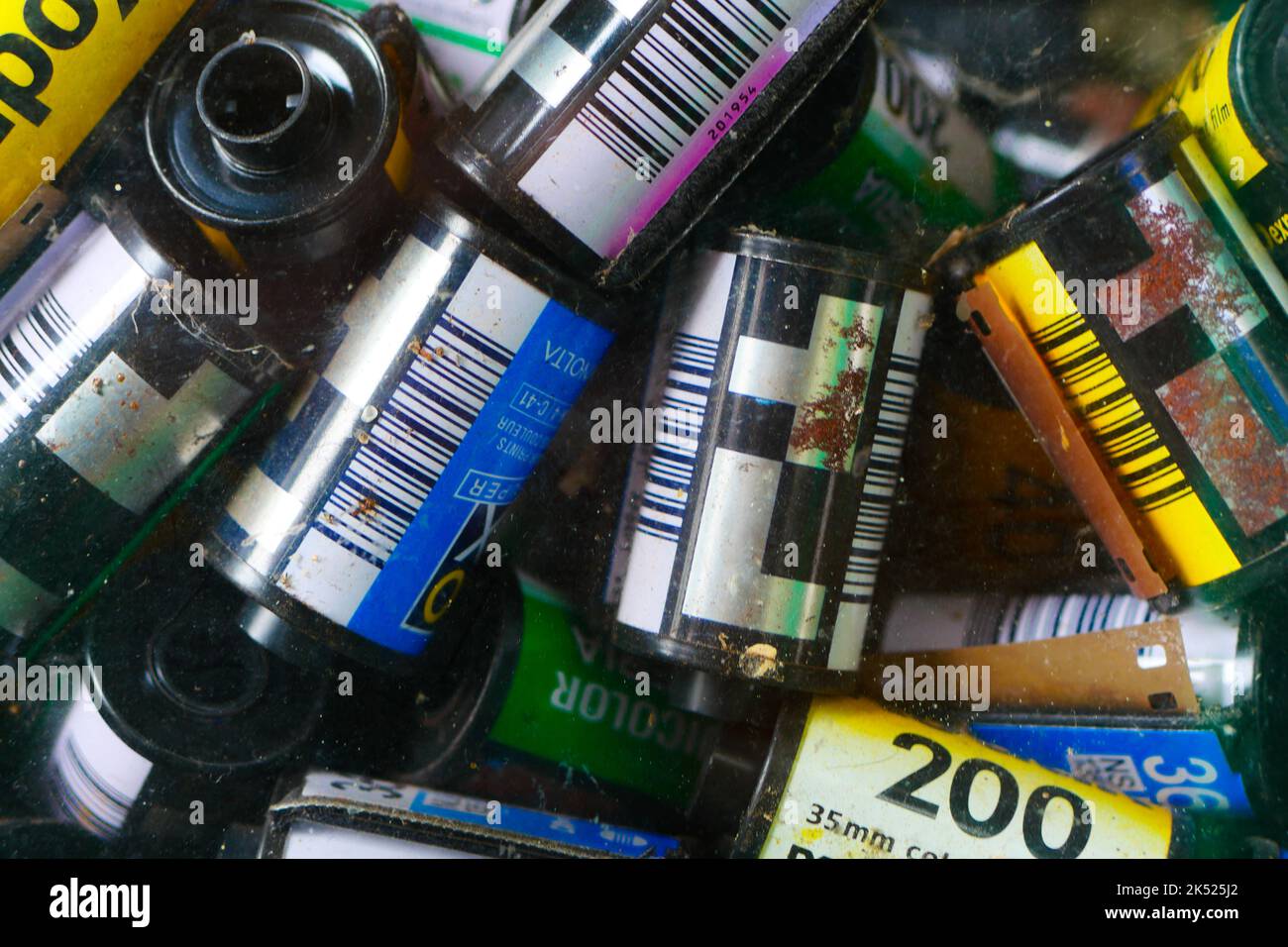 stack of many old 35mm film rolls Stock Photo - Alamy