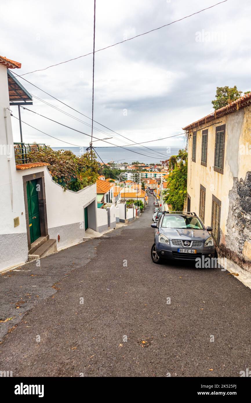 On the road in the romantic port city of Funchal on the Azores island ...