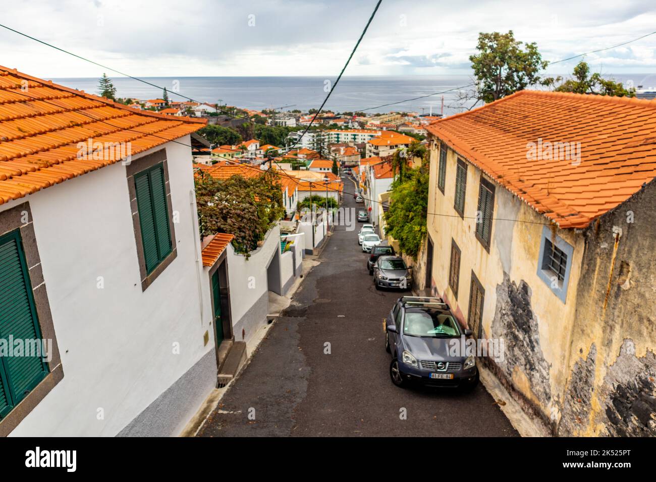 On the road in the romantic port city of Funchal on the Azores island ...