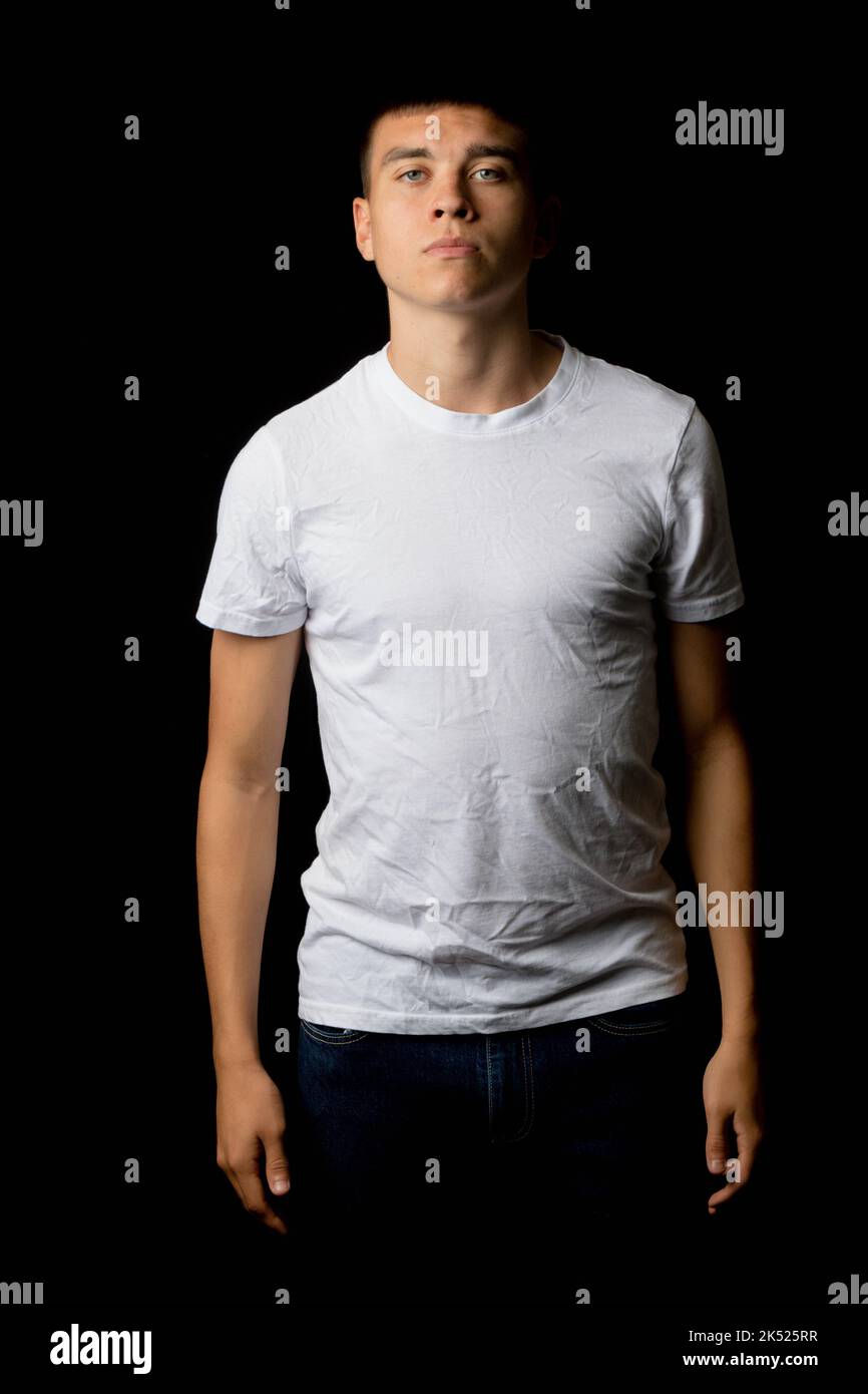 A Portrait of a standing 19 year old teenage boy Stock Photo - Alamy