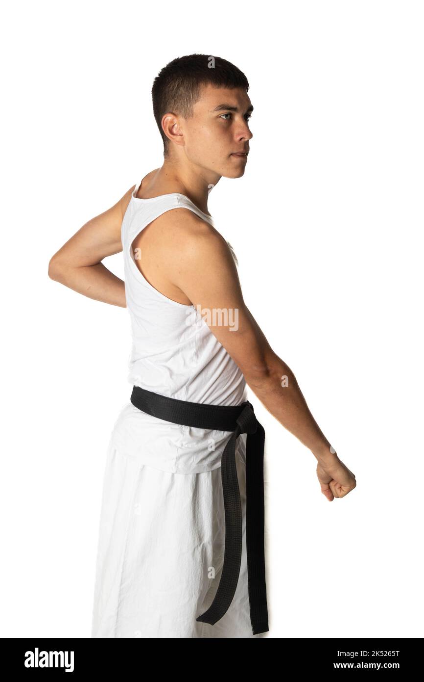 19 Year Old Teenage Boy Practacing a Karate Low Level Groin Block Stock ...