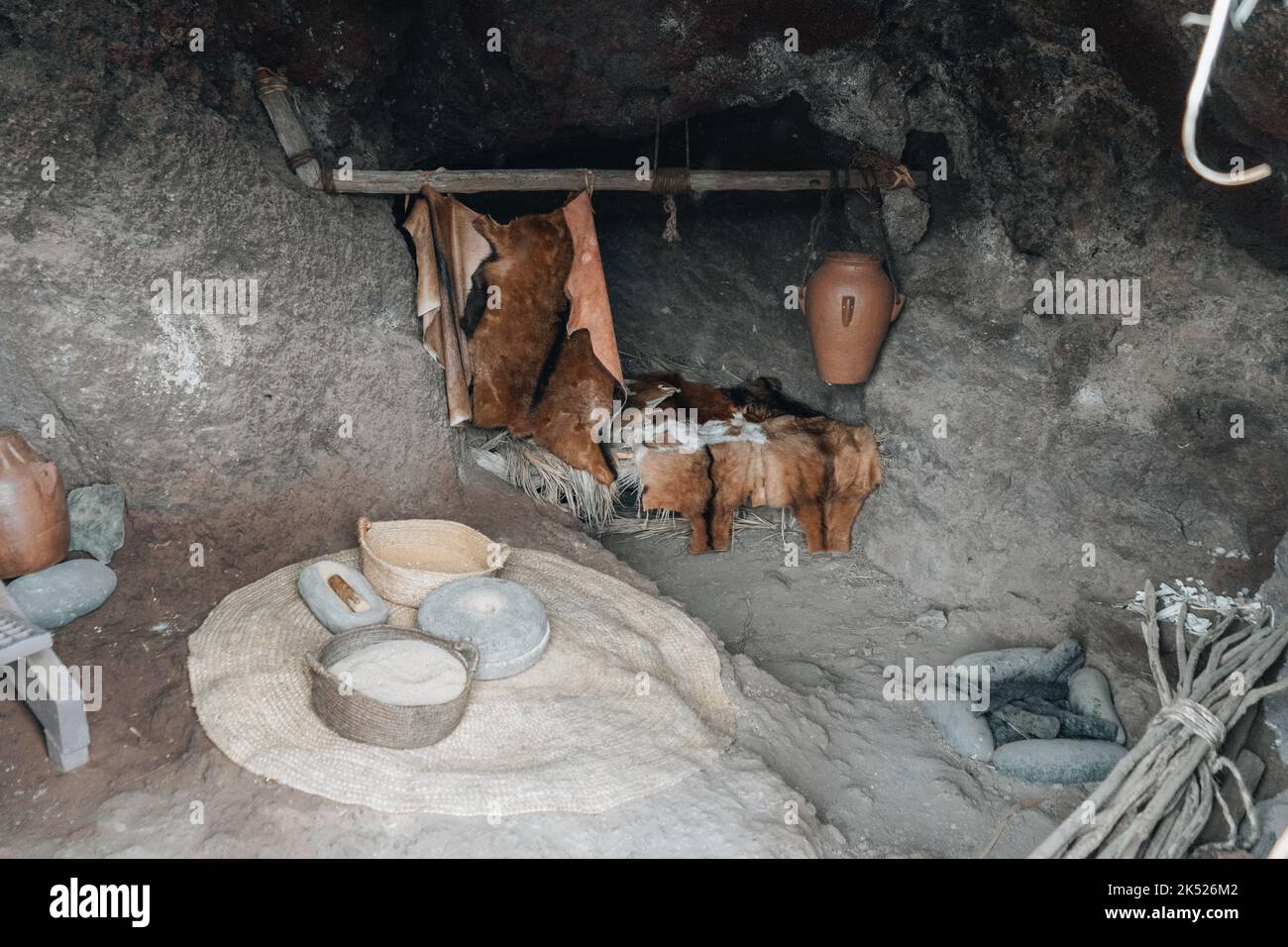 Antique barn reconstruction with tanned hides and pottery, made of hay ...