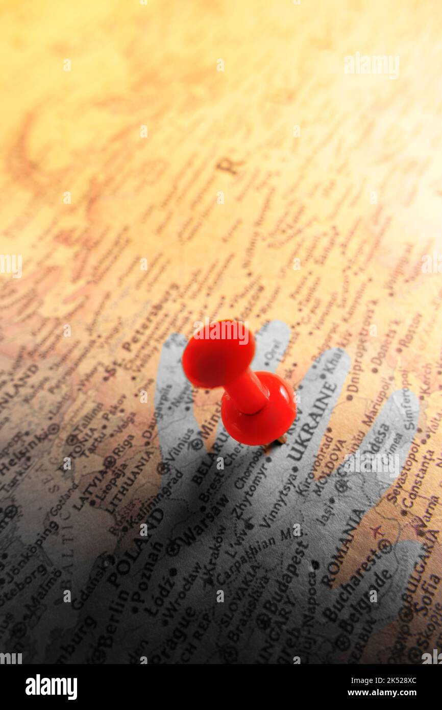 Bright sunlight illuminates territory Russia world map.Red button is ...