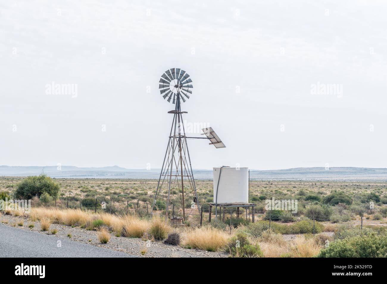 An old windmill next to road R63 near Loxton, used as solar panel ...