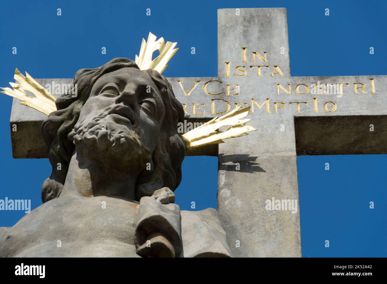 Prague Charles Bridge, Czech Republic: Jesus statue in front of the ...