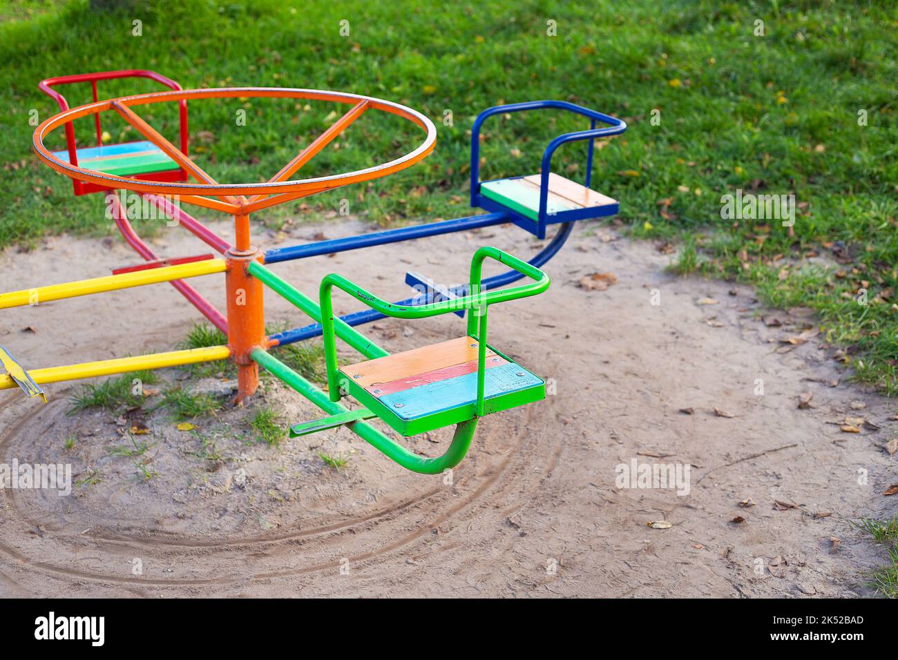 A bright playground, many different children's swings, a beautiful and ...