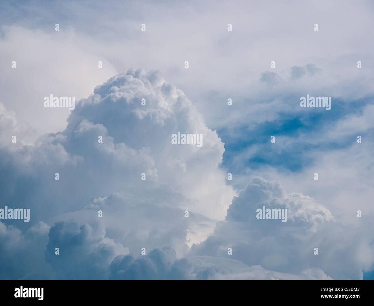 Massive rain cloud, Cumulus congestus, in a cloudy sky Stock Photo - Alamy