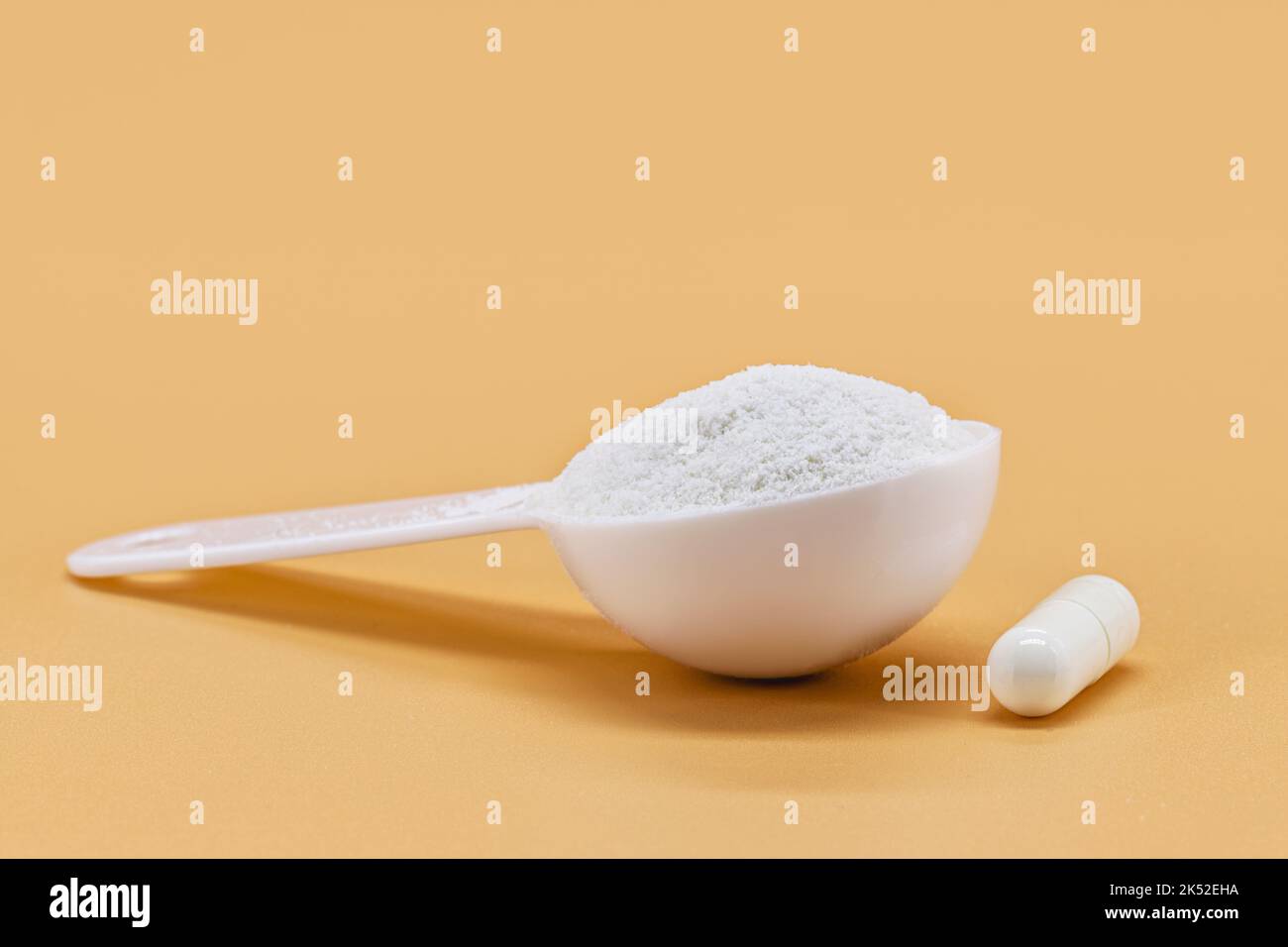 Collagen spoon and pills, protein responsible for ensuring firmness and ...