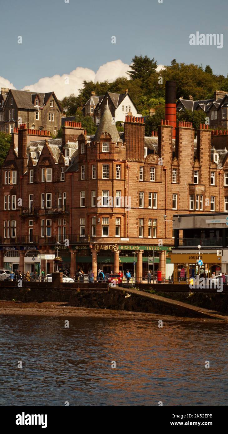 The old, typical buildings by the sea in Scotland, vertical Stock Photo ...