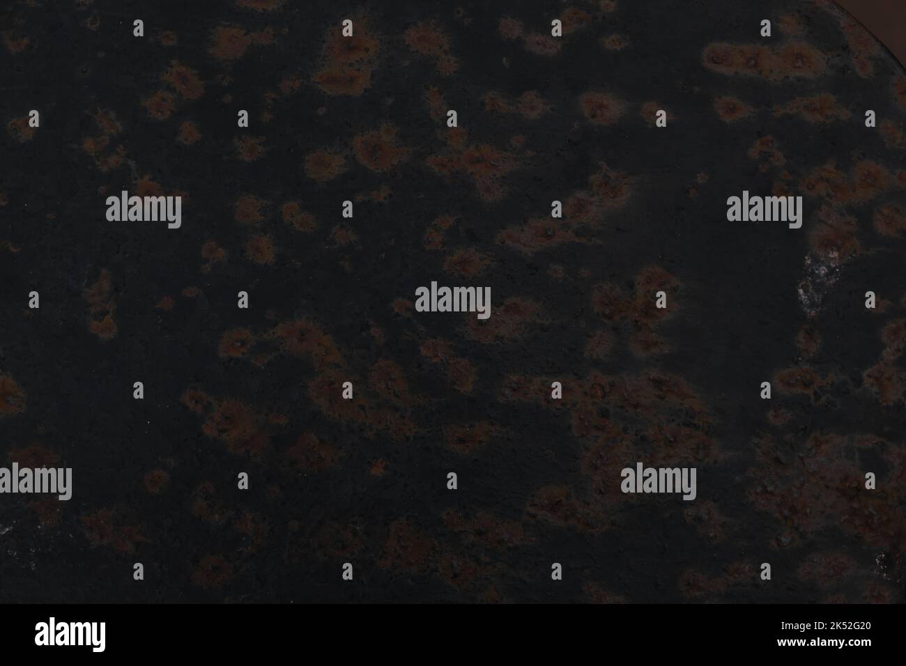 Patterns on steel plate background dark material Stock Photo - Alamy