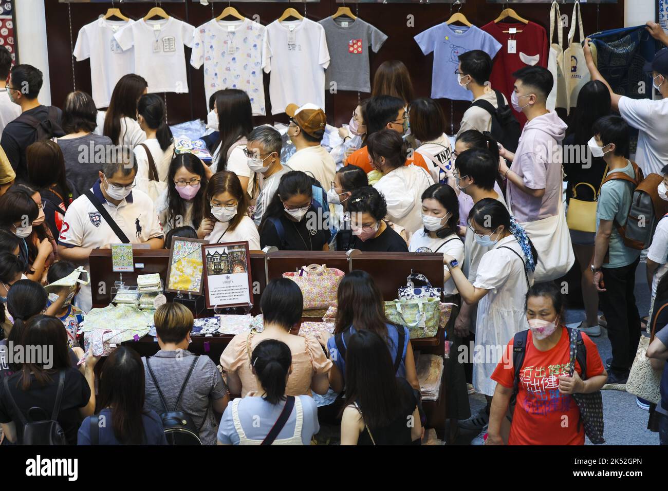 Shopper shopping at the Festival Walk shopping mall in Kowloon Tong ...