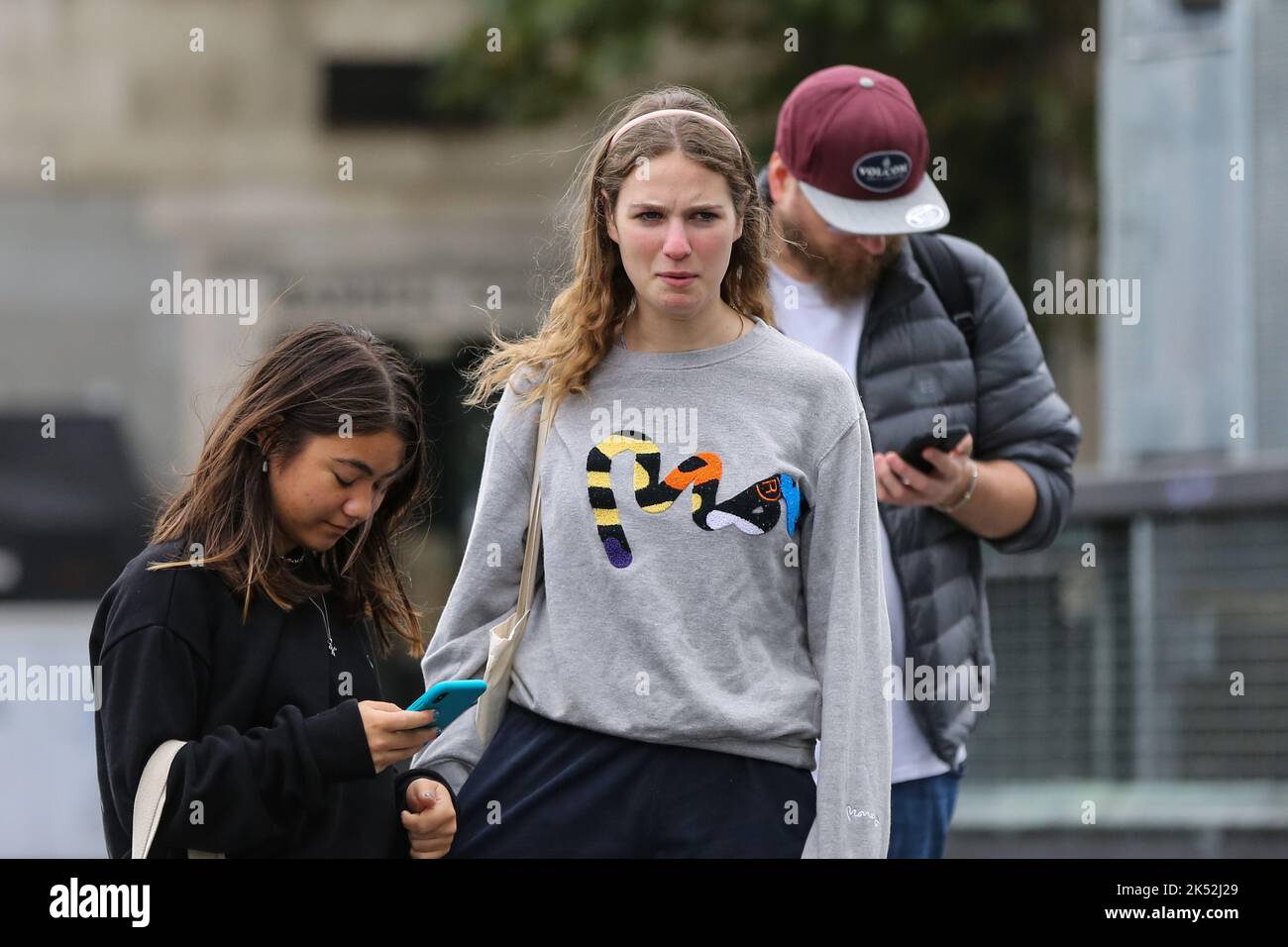 People seen using their mobile phones outside Warren Street station in ...