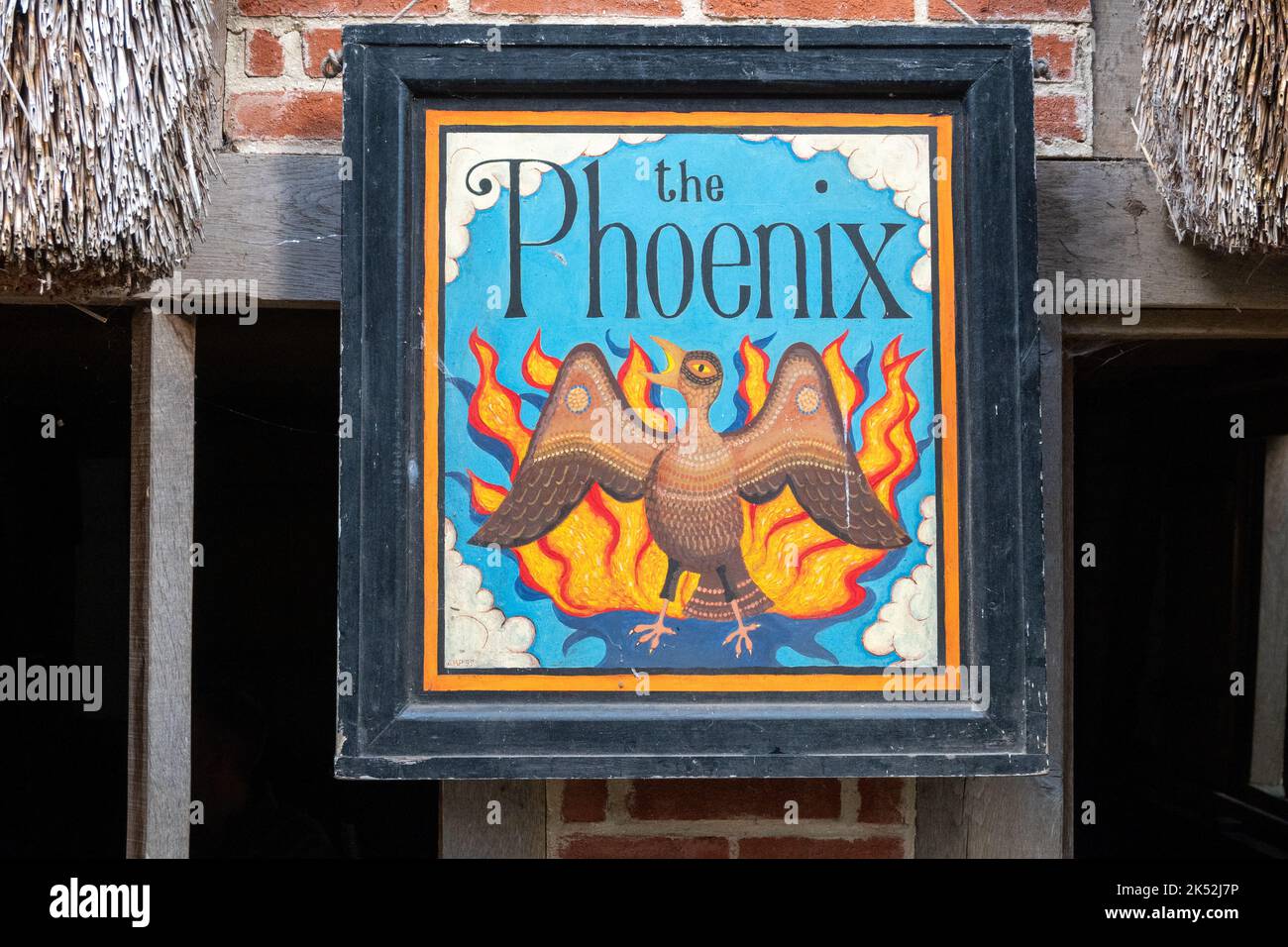Pub sign for the Pheonix, the inn part of the traditional village ...