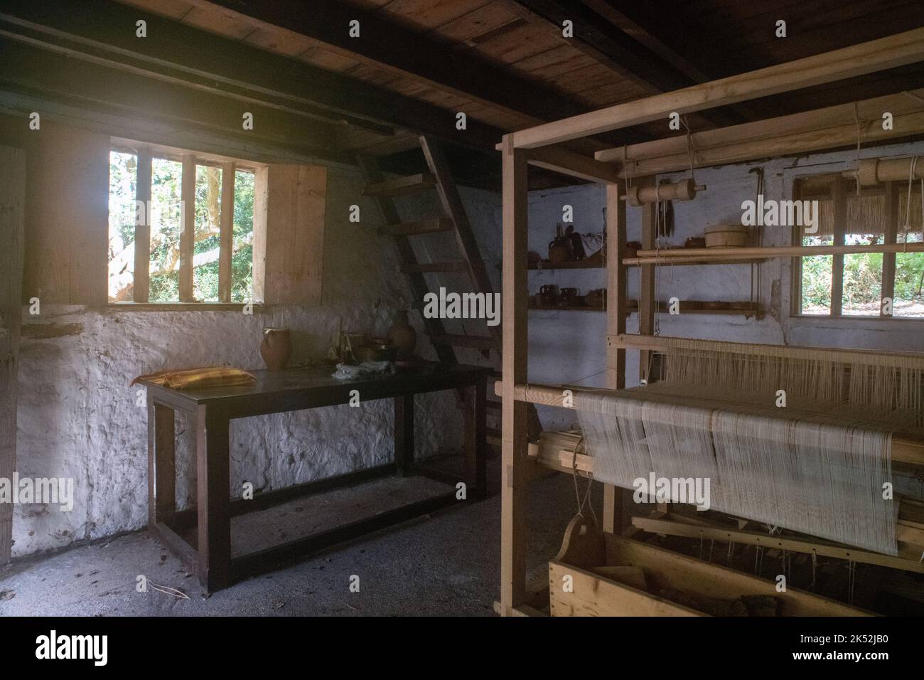 Traditional slatted windows in a recreation of a 1642 village dwelling ...