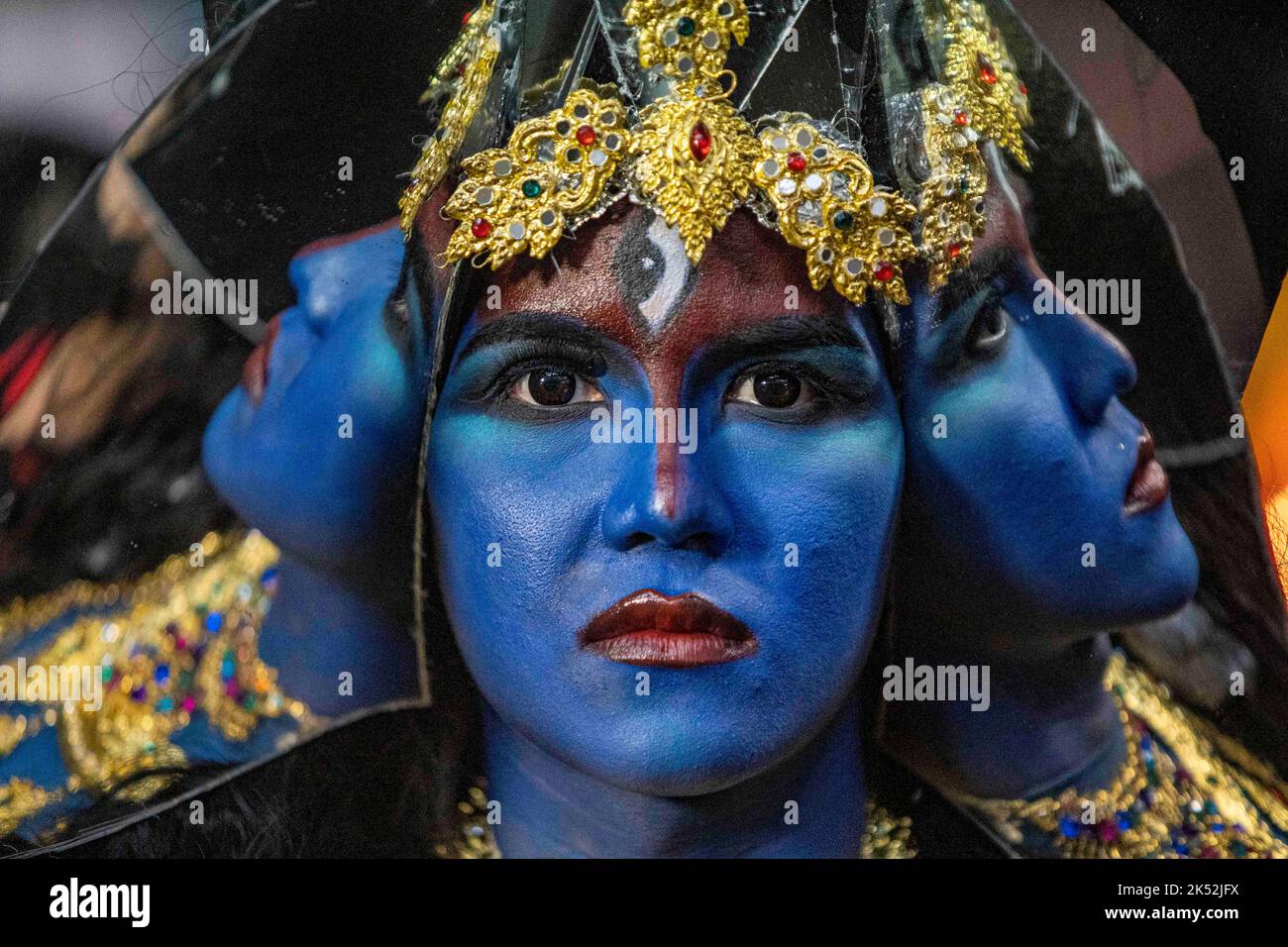 Bangkok, Thailand. 5th Oct, 2022. A woman wearing blue face paint and ...